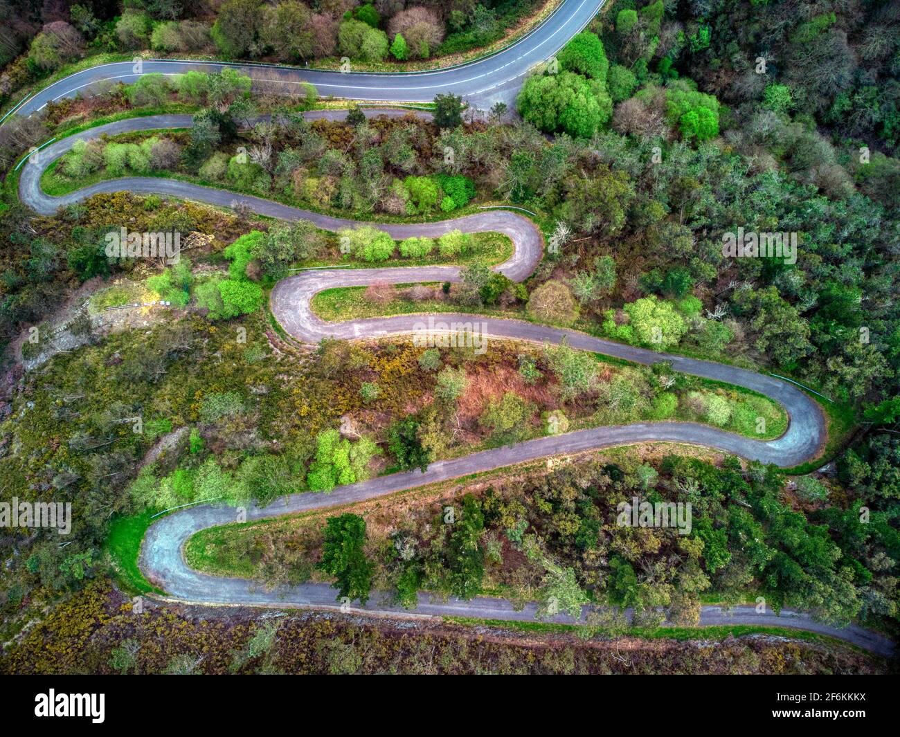 Aerial view of winding road in spring in Asturias, Spain Stock Photo ...