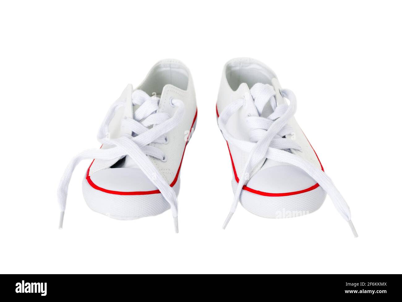 White canvas shoes with red strip. Isolated on a white background Stock ...