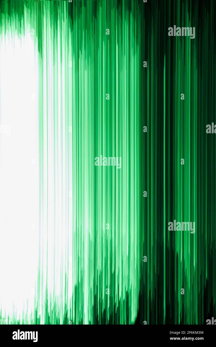 straight green light lines on a black background Stock Photo - Alamy