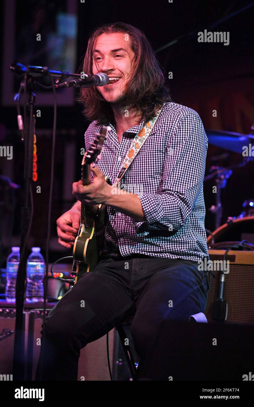 Boca Raton - FL - 20201116 Jackson Stokes plays the guitar while ...