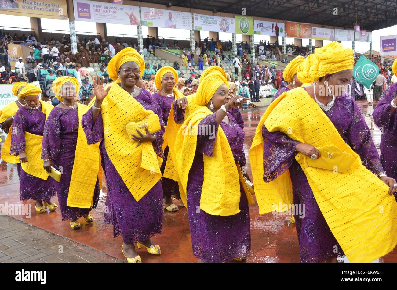 Nigerian women showcasing their traditional attire in paying homage to ...