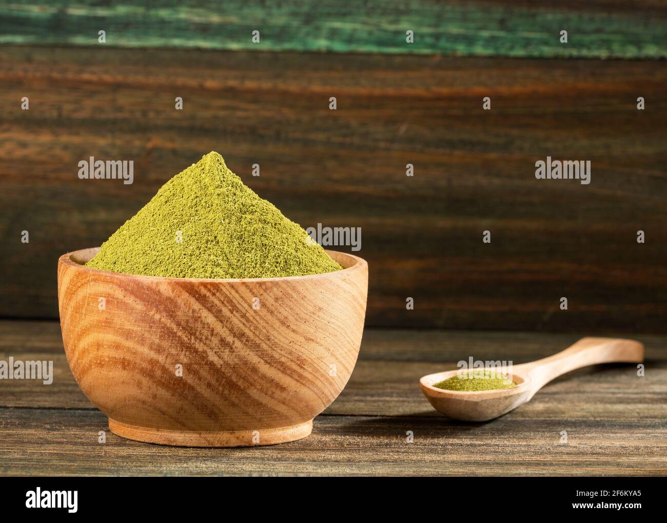 Moringa powder - Moringa oleifera. Wood background Stock Photo - Alamy