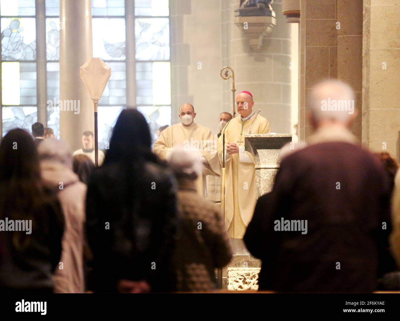 Essen, Germany. 01st Apr, 2021. Bishop Josef Overbeck celebrates the ...