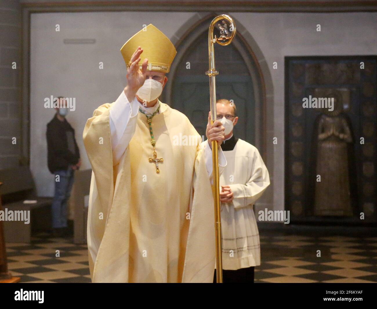Essen, Germany. 01st Apr, 2021. Bishop Josef Overbeck enters the ...