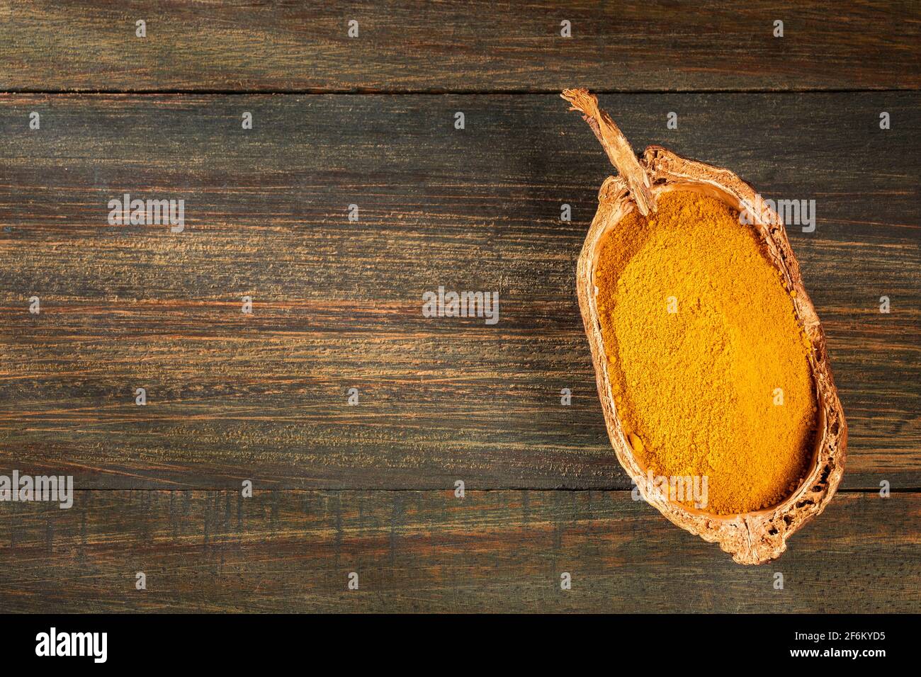 Organic turmeric powder - Curcuma longa Stock Photo - Alamy