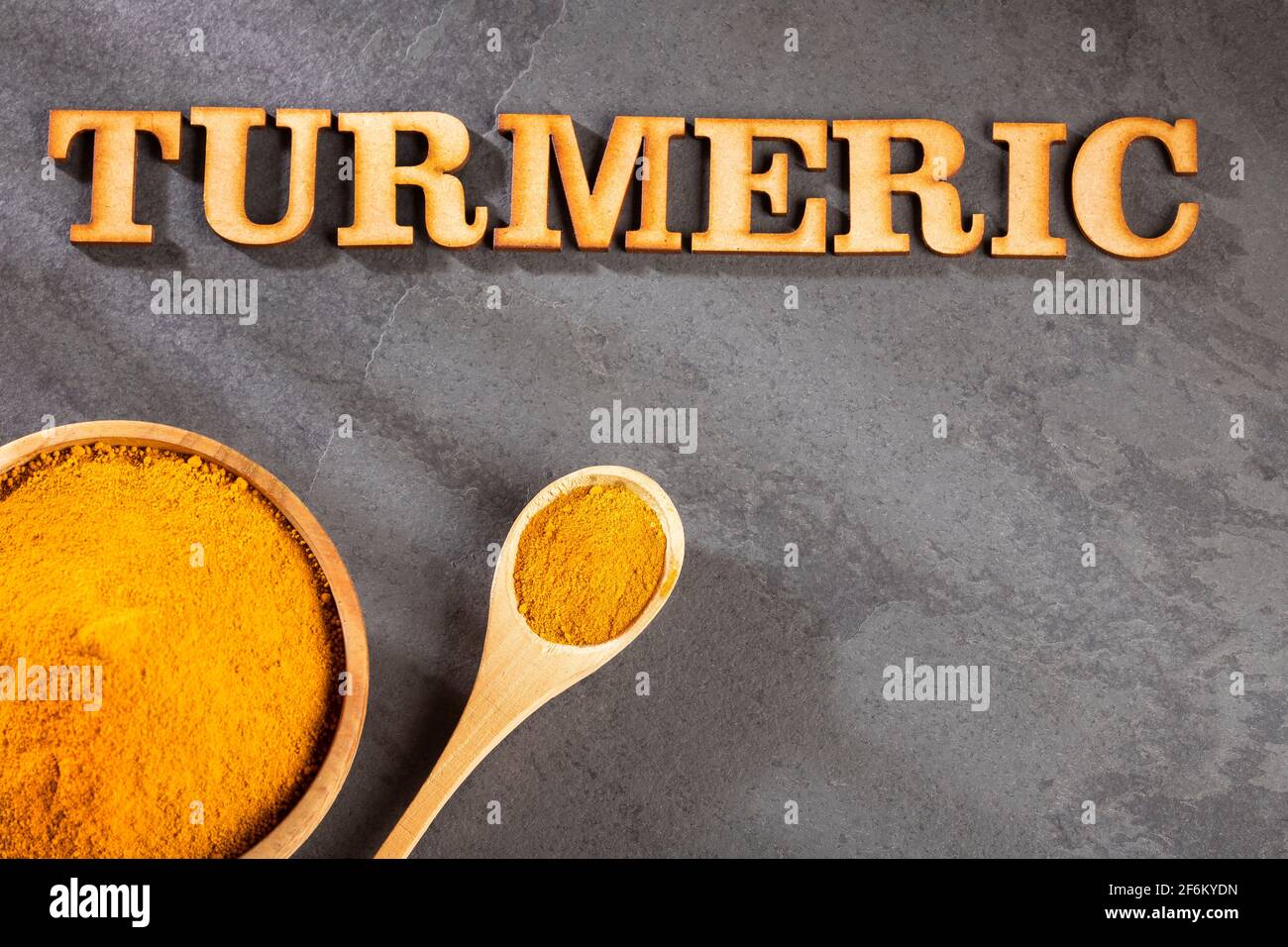 Organic turmeric powder - Curcuma longa Stock Photo - Alamy