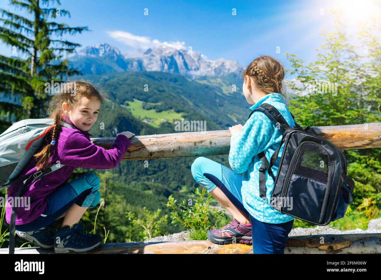 Children hiking on beautiful summer day in alps mountains Austria ...