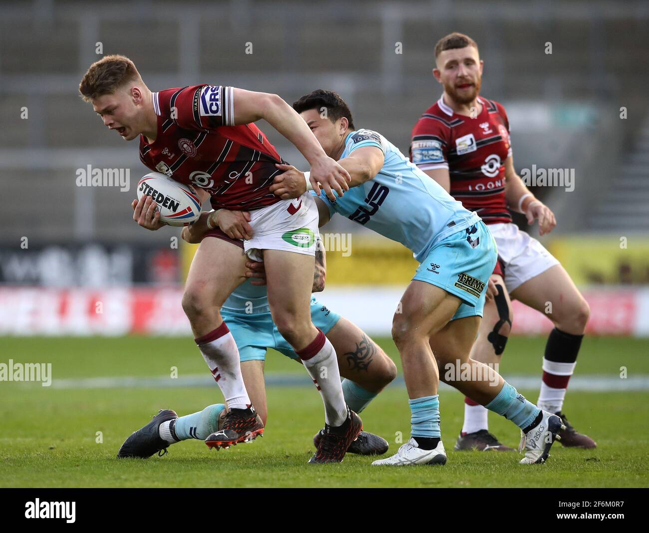 Wigan Warriors' Morgan Smithies tackled by Wakefield Trinity's Jay ...