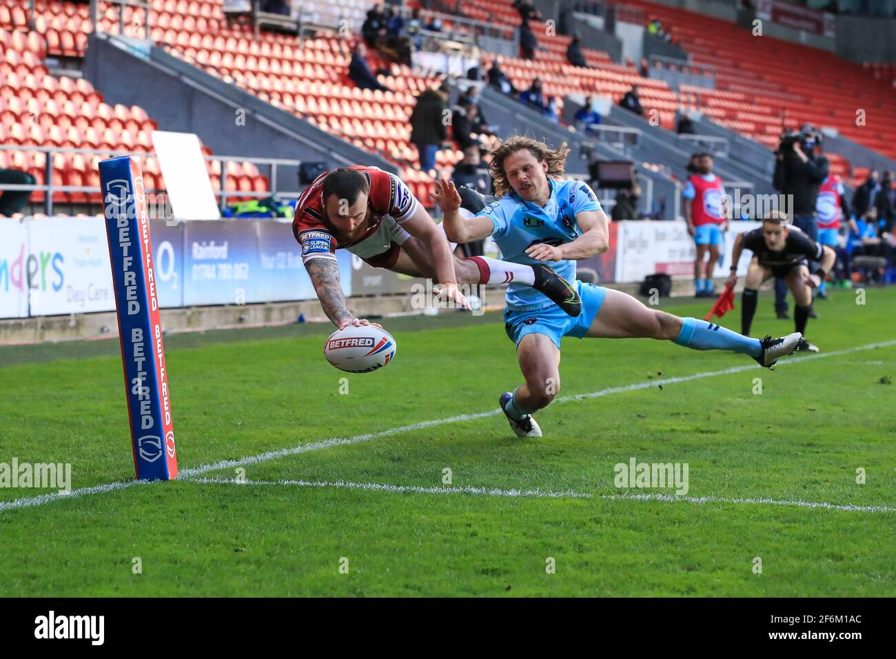 Jake Bibby (22) of Wigan Warriors goes over for a try in, on 4/1/2021 ...