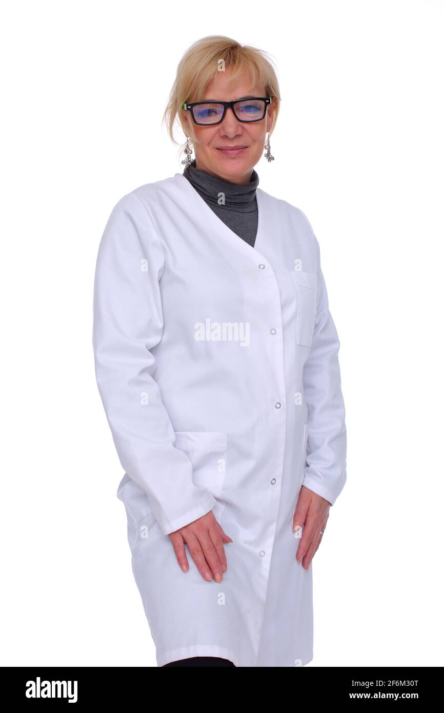 Fifty year old lady doctor in stands wearing a doctor's apron. Front ...