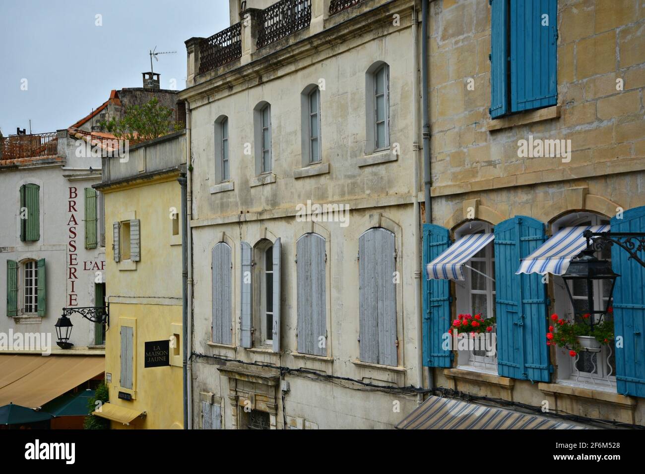 Provençal style architecture in the historic center of Arles in ...