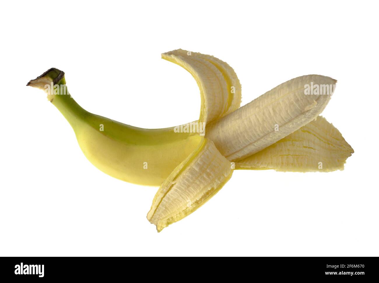 One ripe banana, half peeled on a white background, isolated Stock ...