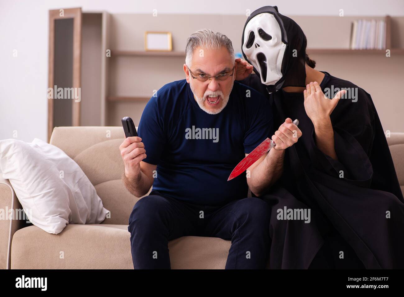 Devil coming to old dying man Stock Photo - Alamy