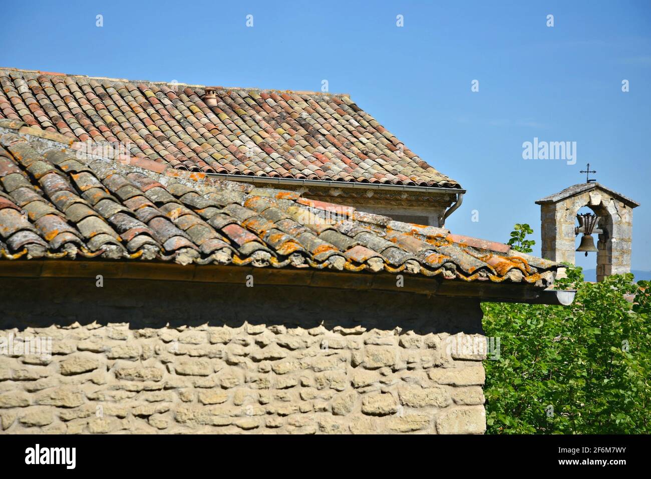 Landscape with Provençal style clay tile rooftops and the Romanesque ...