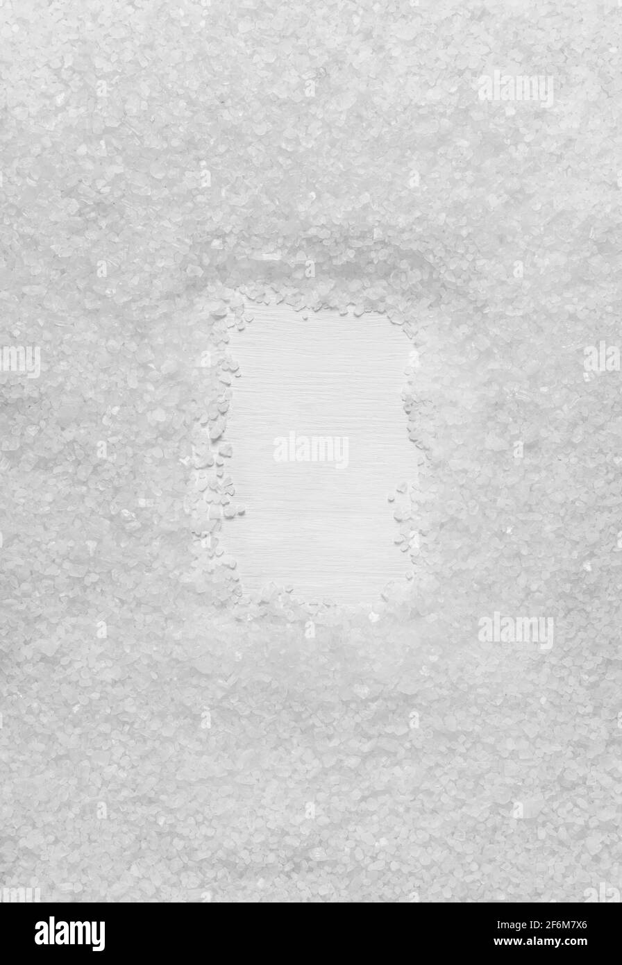 Background from white sea salt. Copy space rectangular shape. Coarse ...
