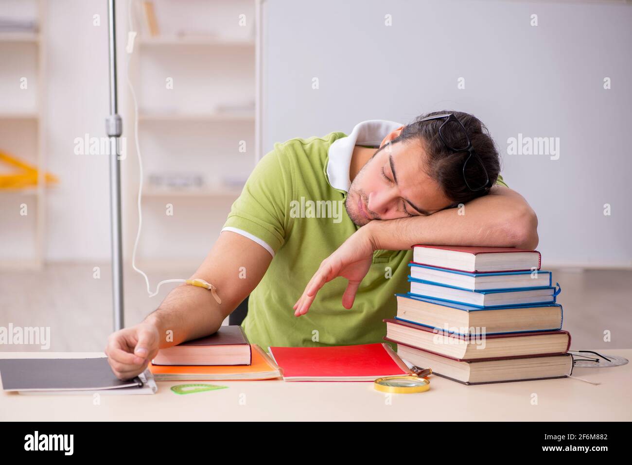 Young sick teacher student in blood transfusion concept Stock Photo - Alamy