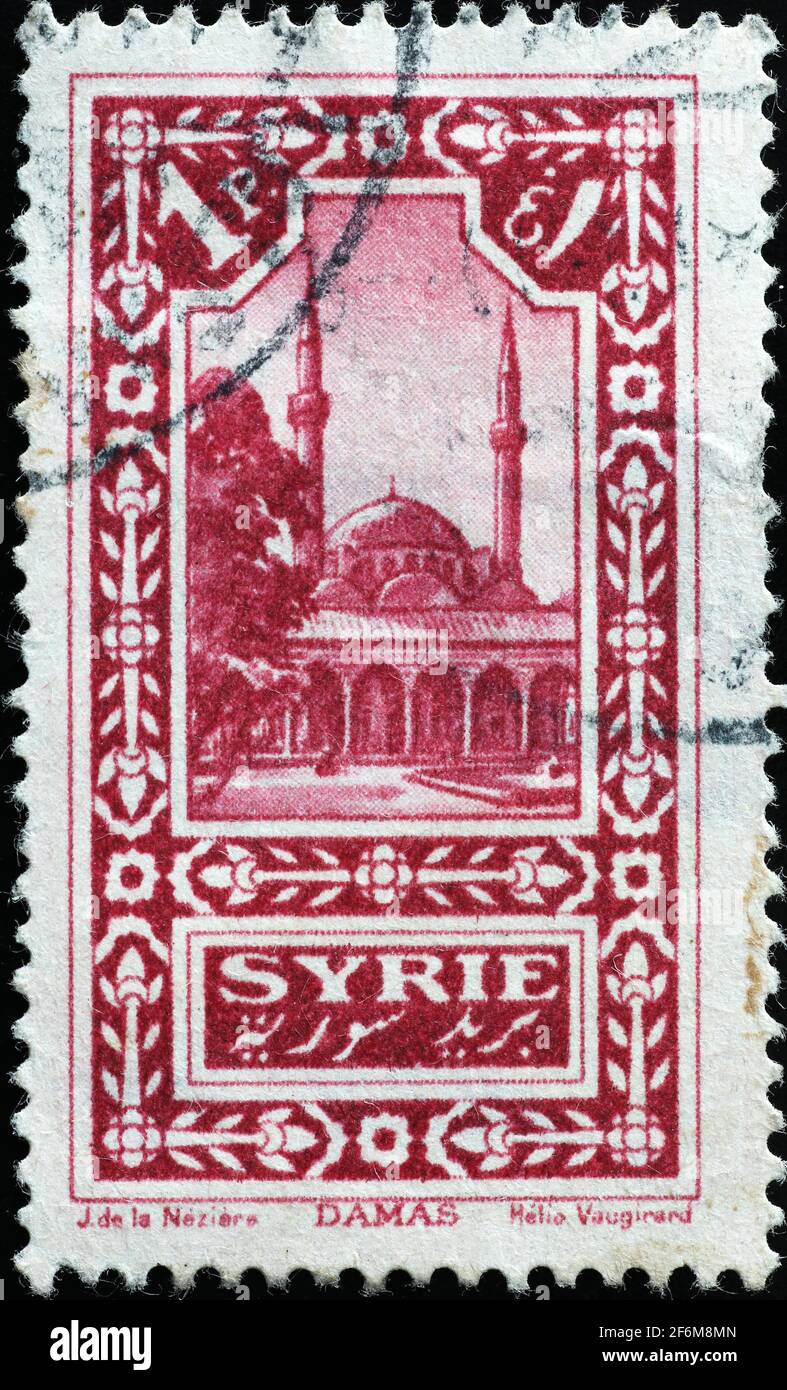 Ancient mosque on vintage syrian postage stamp Stock Photo - Alamy