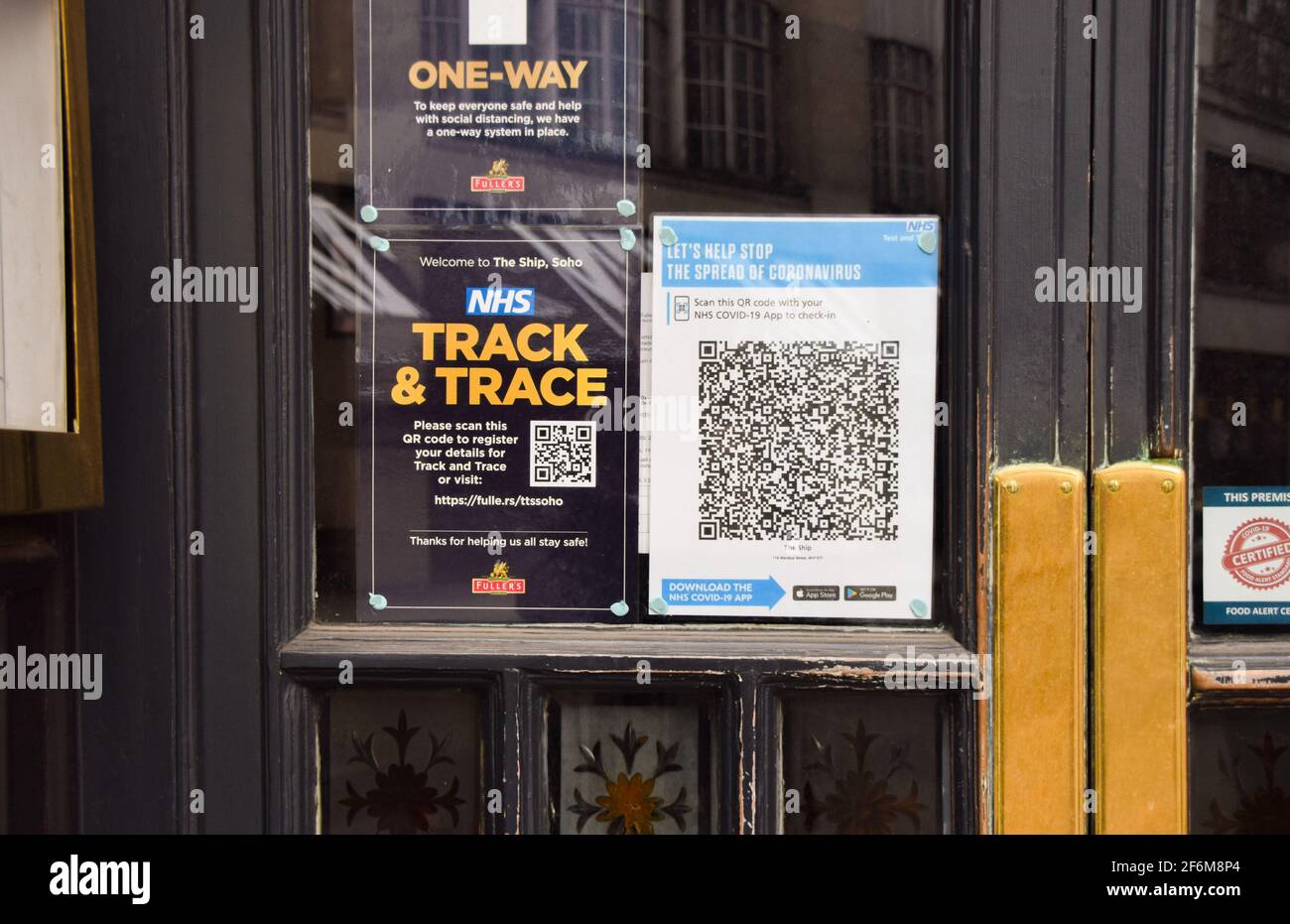 London, UK. 1st Apr, 2021. An NHS Track and Trace sign at the Ship pub ...