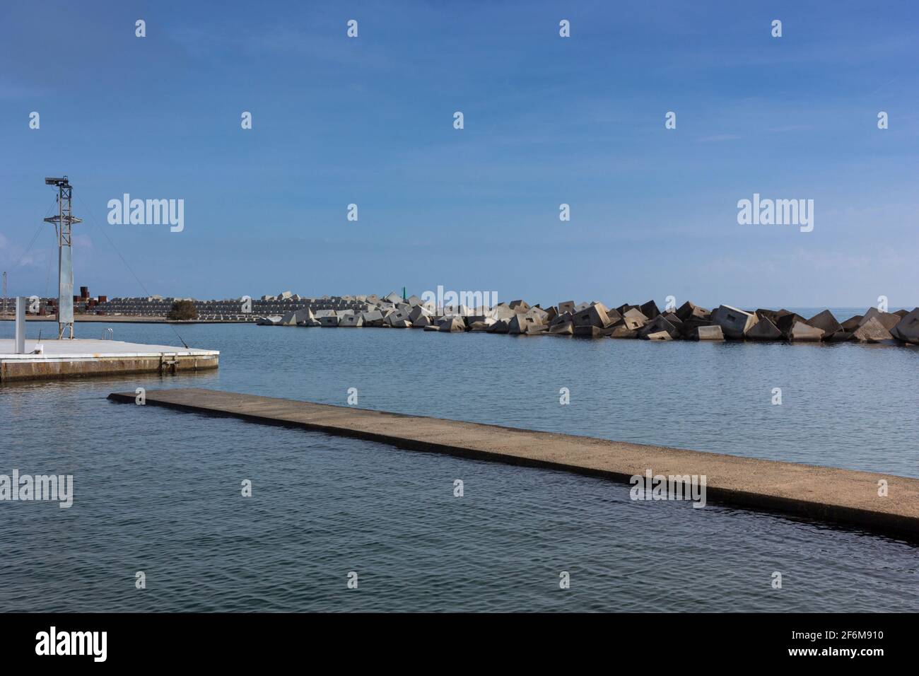 Saltwater pool in the Mediterranean Sea, in winter, without waves and a ...