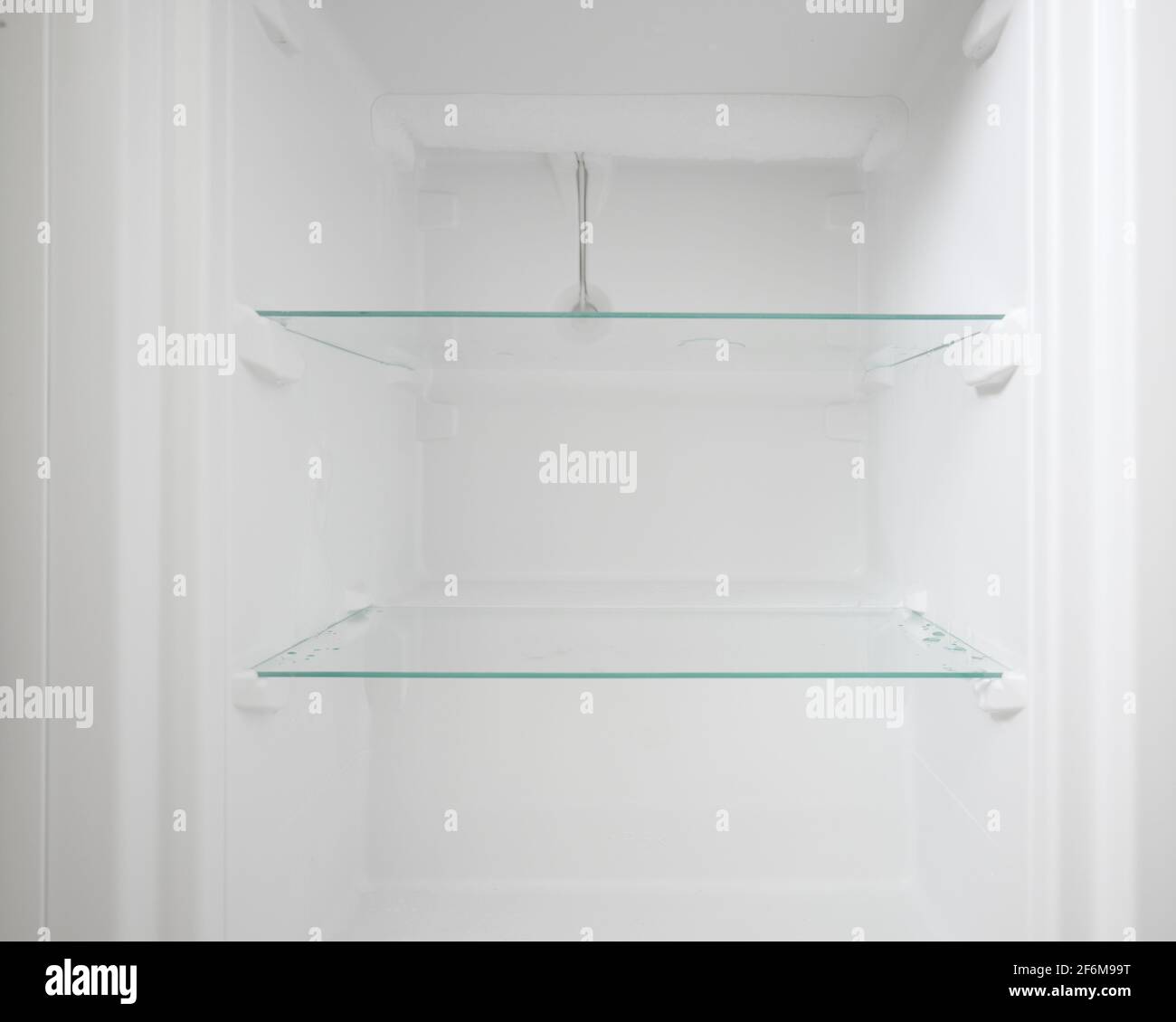 An empty refrigerator. Inside an empty, clean refrigerator, a ...