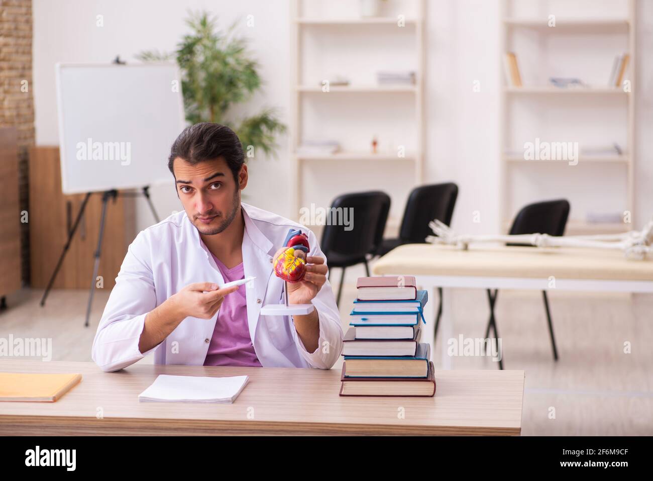 Young doctor student cardiologist sitting in the classroom Stock Photo ...