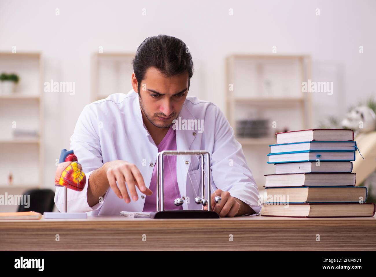 Young doctor student sitting in the classroom Stock Photo - Alamy