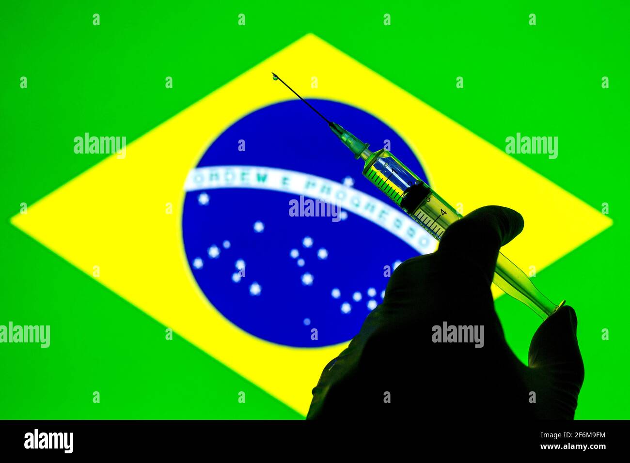 In this photo illustration, a close up of a hand holding a medical ...