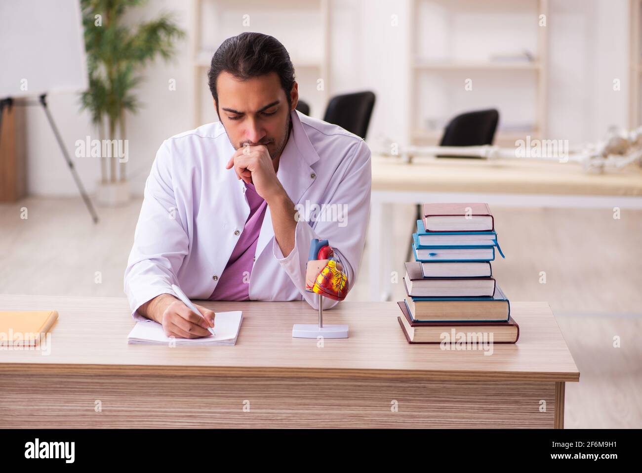 Young doctor student cardiologist sitting in the classroom Stock Photo ...