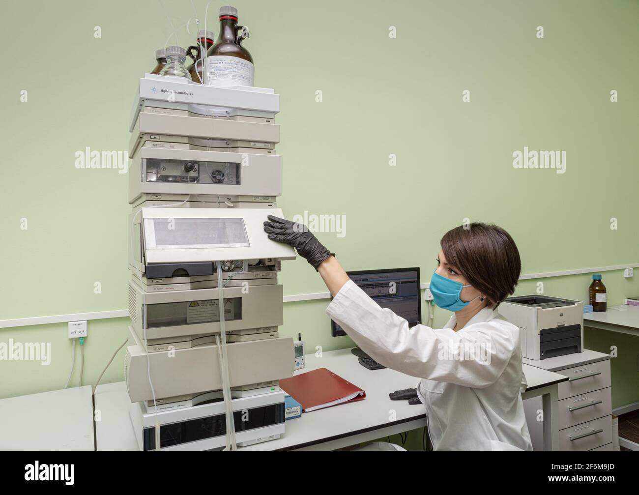 Conducting chemical and biological experiments in the laboratory Stock ...