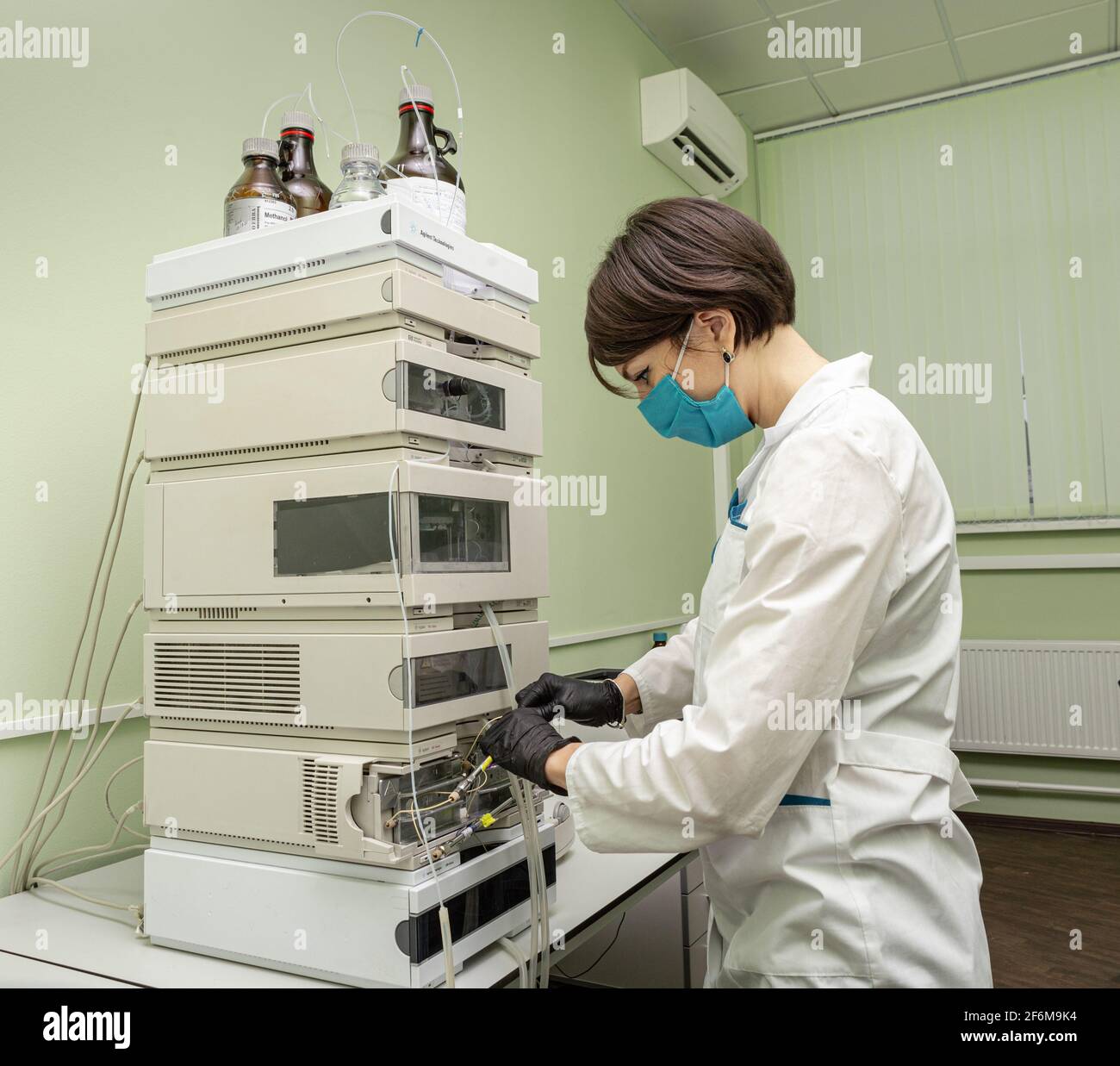 Conducting chemical and biological experiments in the laboratory Stock ...