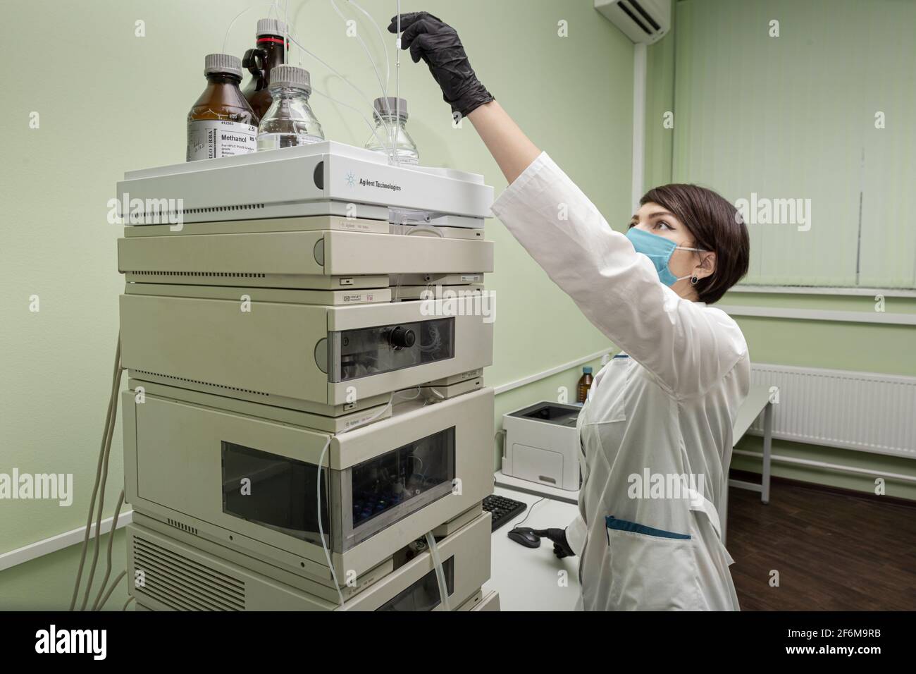 Conducting chemical and biological experiments in the laboratory Stock ...