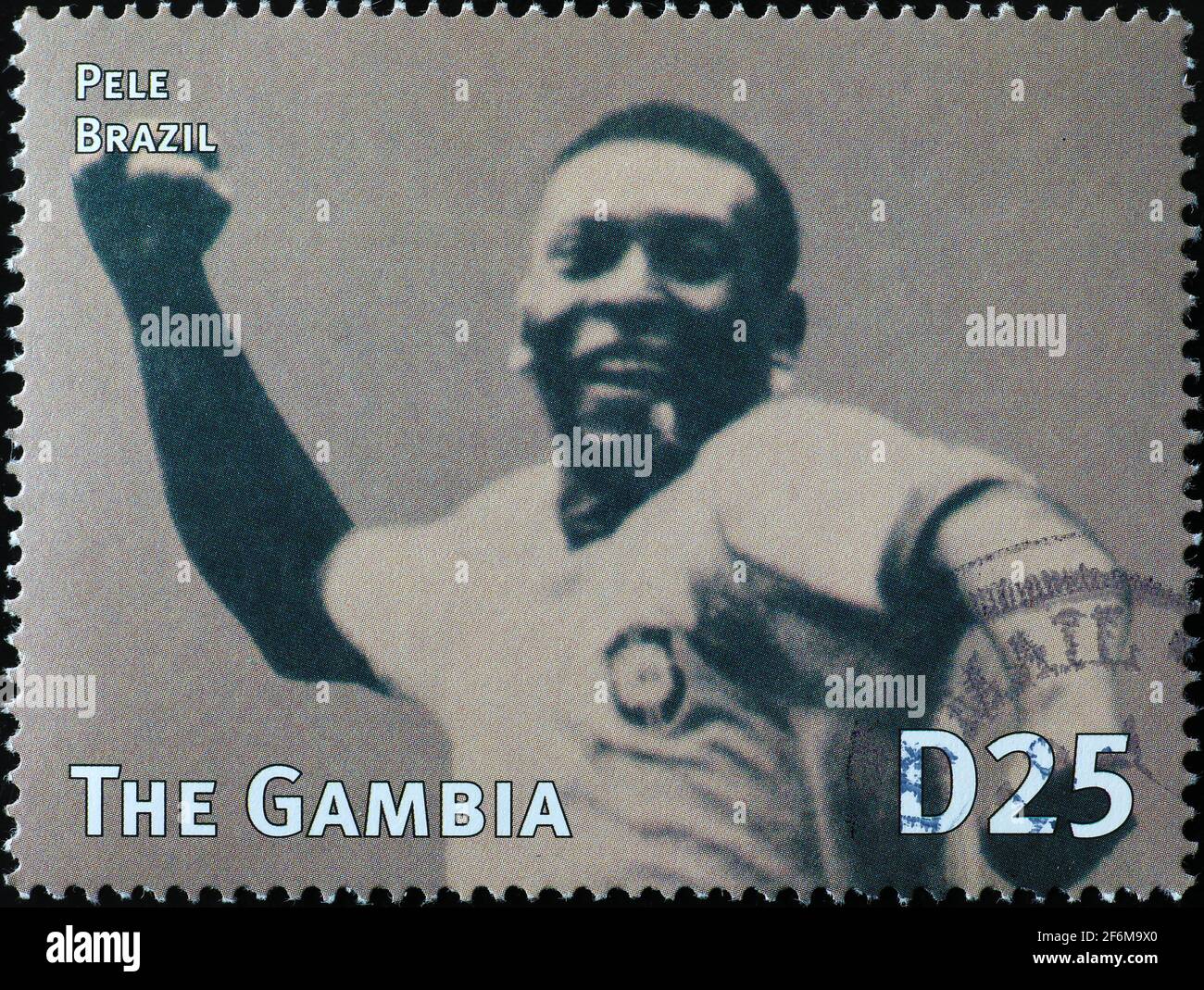 Old picture of a young Pelè on postage stamp Stock Photo - Alamy