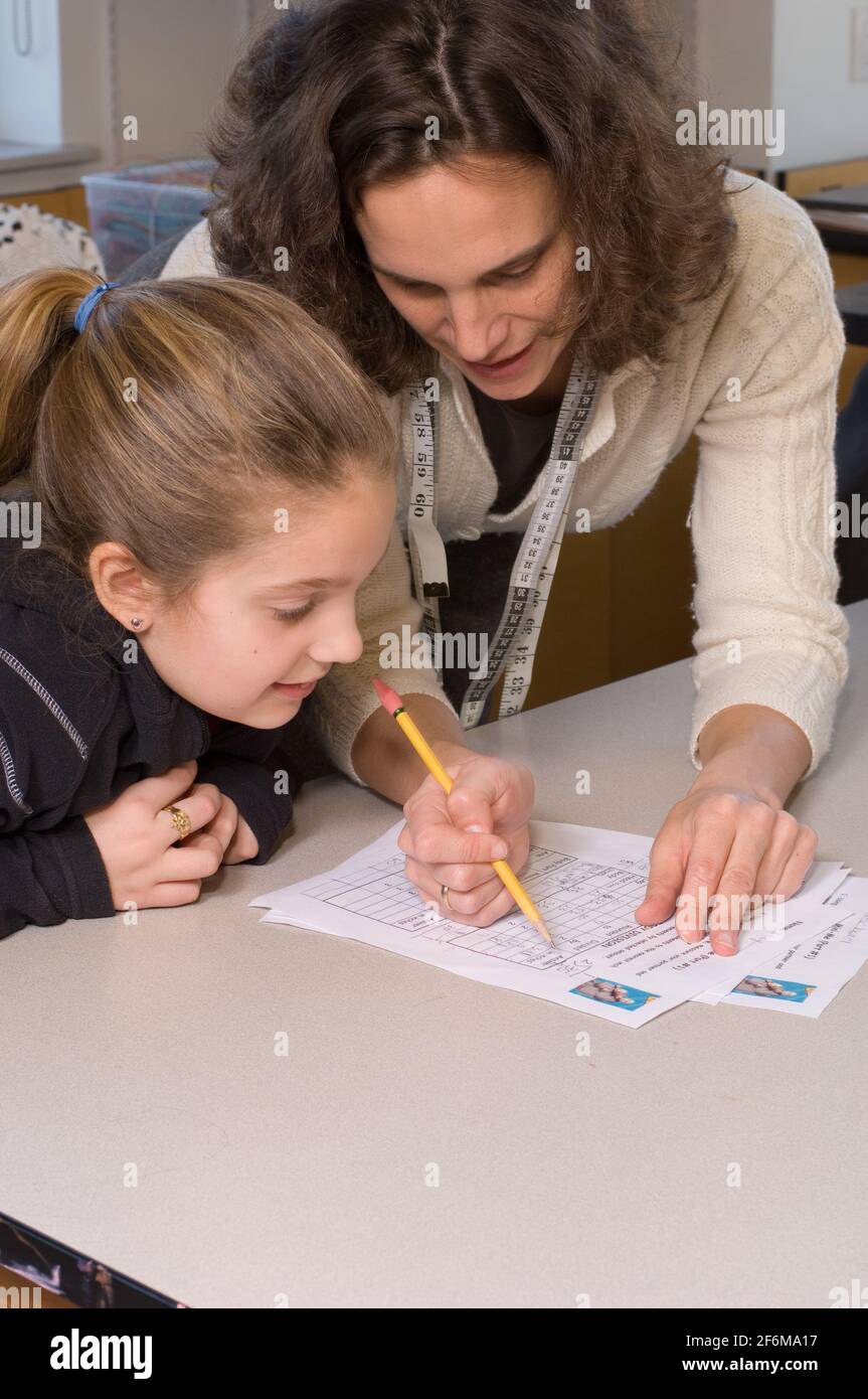 Grade 4 teacher hi-res stock photography and images - Alamy