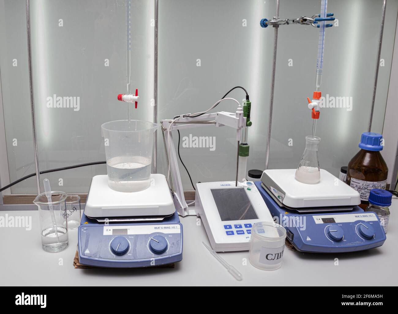 Conducting chemical and biological experiments in the laboratory Stock ...