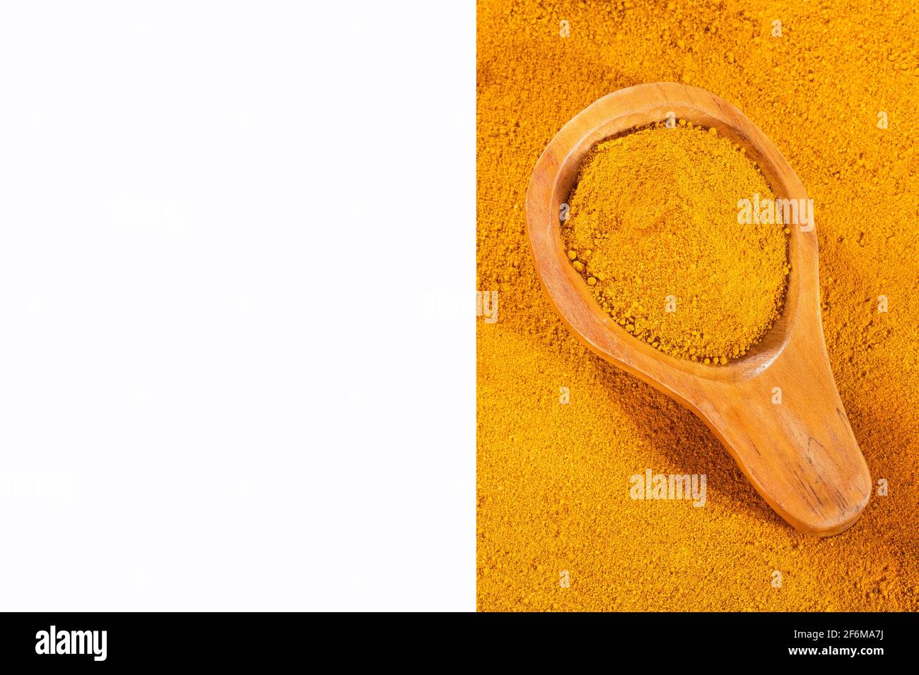 Curcuma longa - Organic turmeric powder. Text space Stock Photo - Alamy