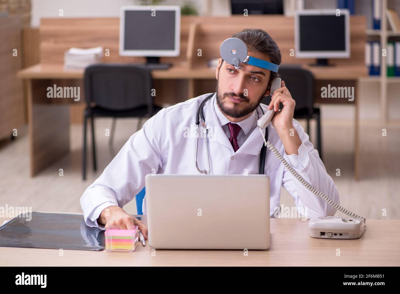 Ent doctor sitting in his practice hi-res stock photography and images ...