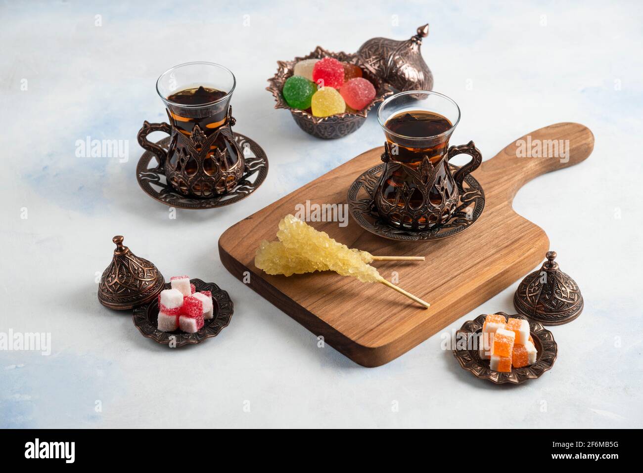 Classic Turkish tea set. Sweet candies and hot teas Stock Photo - Alamy