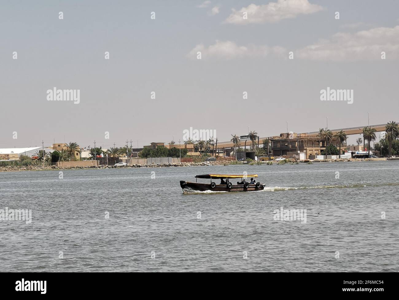 basra, Iraq - april 27, 2018: photo of boat in the river in basra city ...