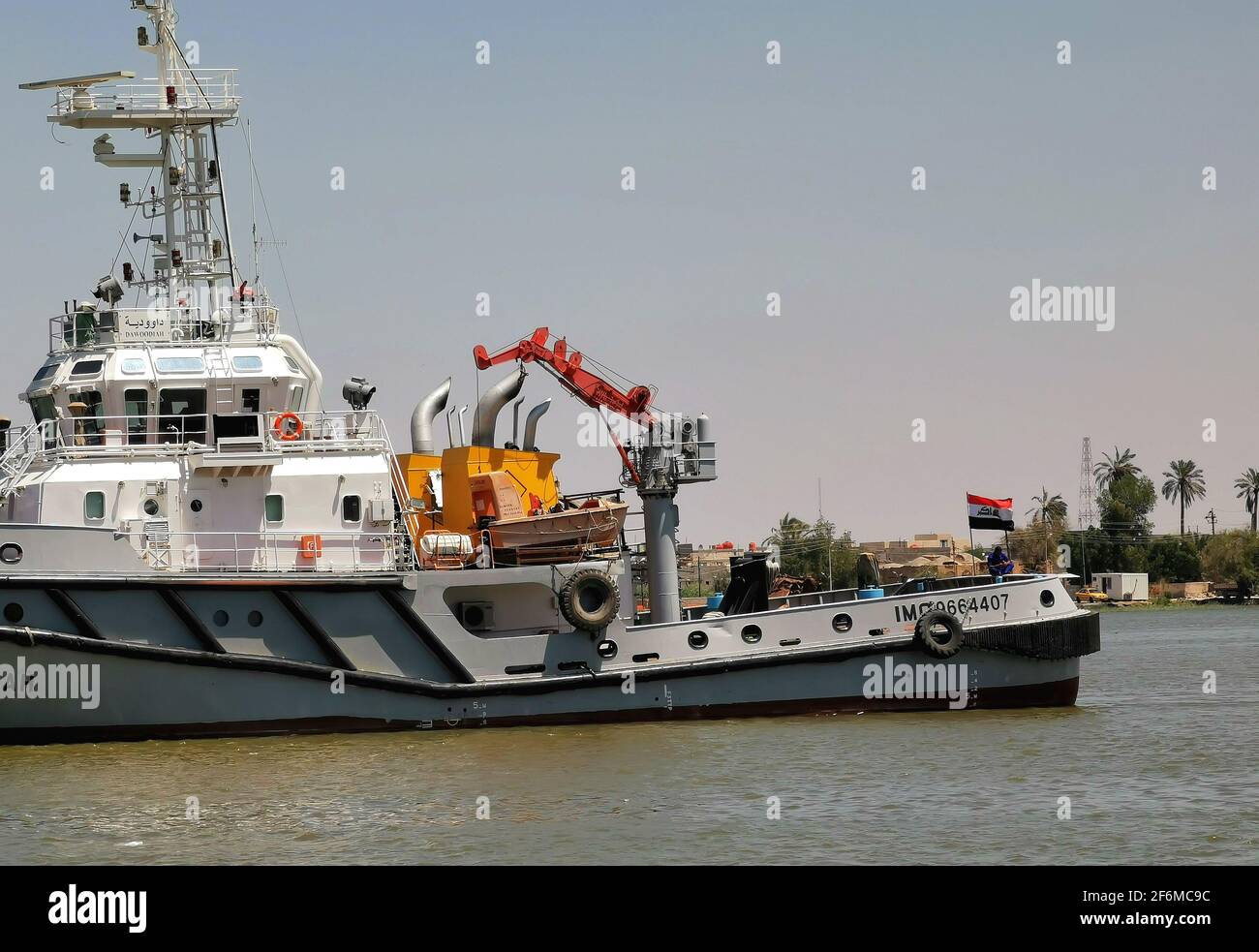 basra, Iraq - april 27, 2018: photo of boat in the river in basra city ...