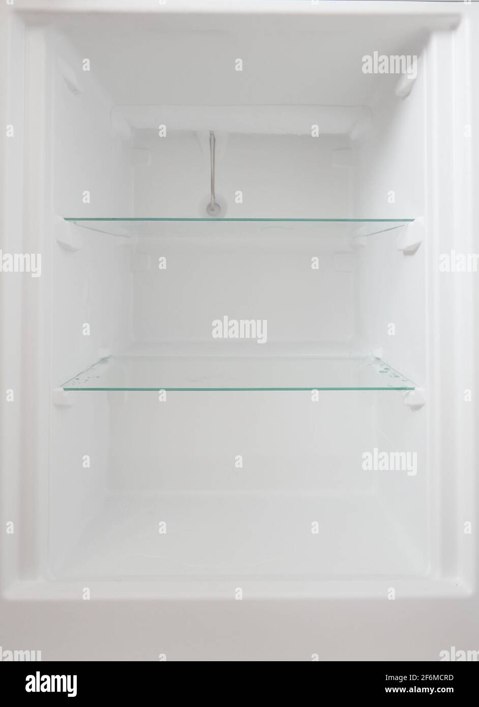 An empty refrigerator. Inside an empty, clean refrigerator, a ...
