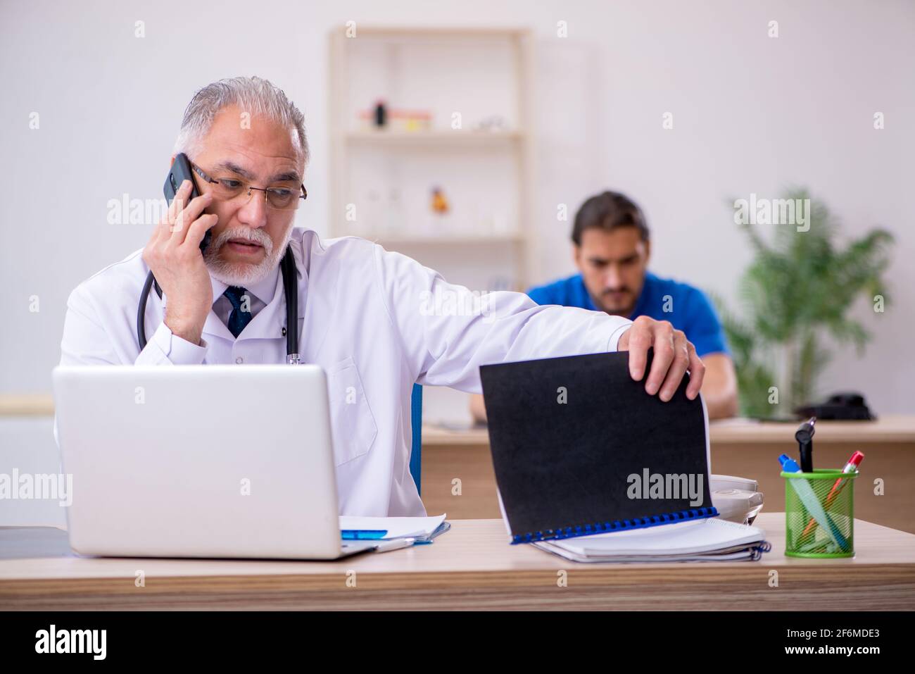 Two doctors working in the hospital Stock Photo - Alamy