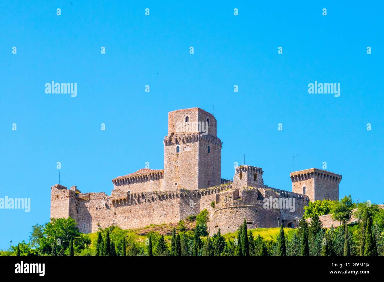 The Rocca Maggiore above the famous medieval town of Assisi, Umbria ...