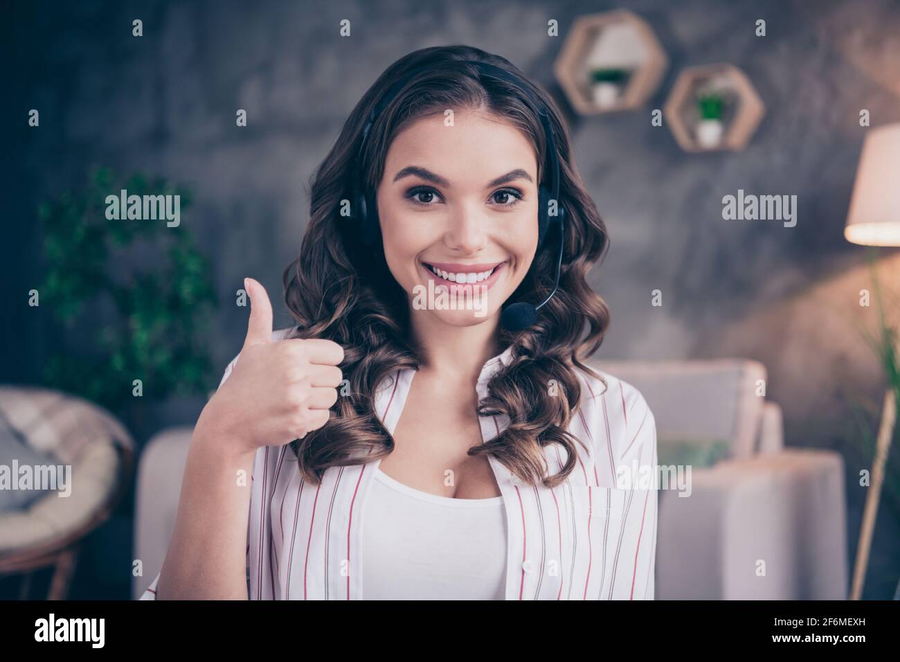 Photo Of Optimistic Brunette Curly Hairdo Lady Talk In Mic Show Thumb