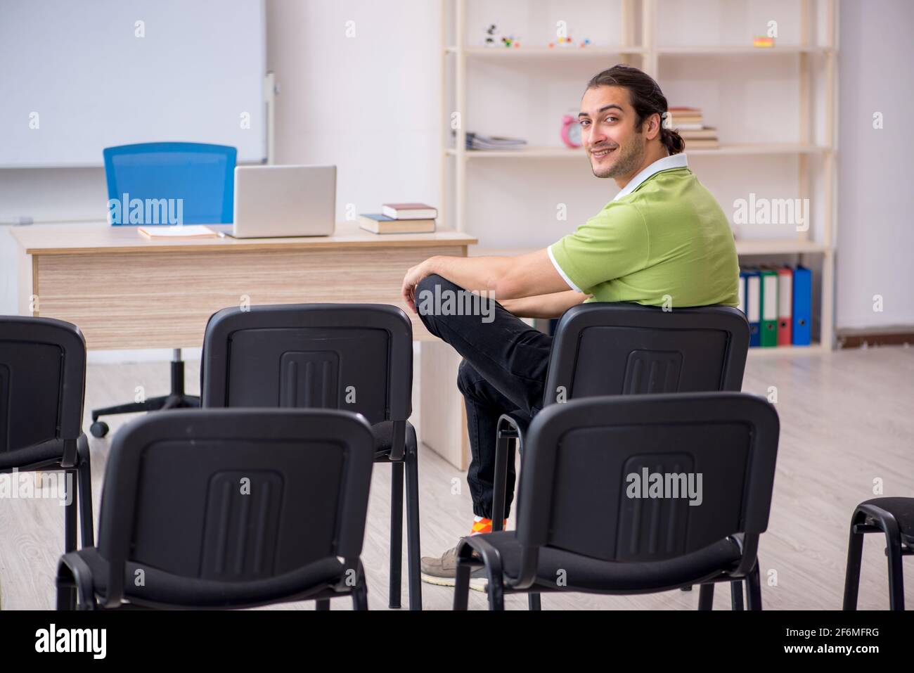 Young student in business presentation concept Stock Photo - Alamy