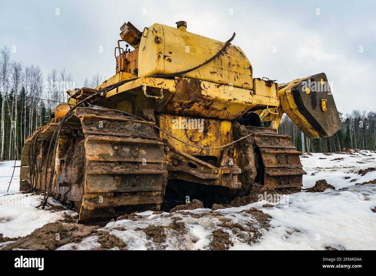Old abandoned faulty construction bulldozer equipment. Disassembled ...