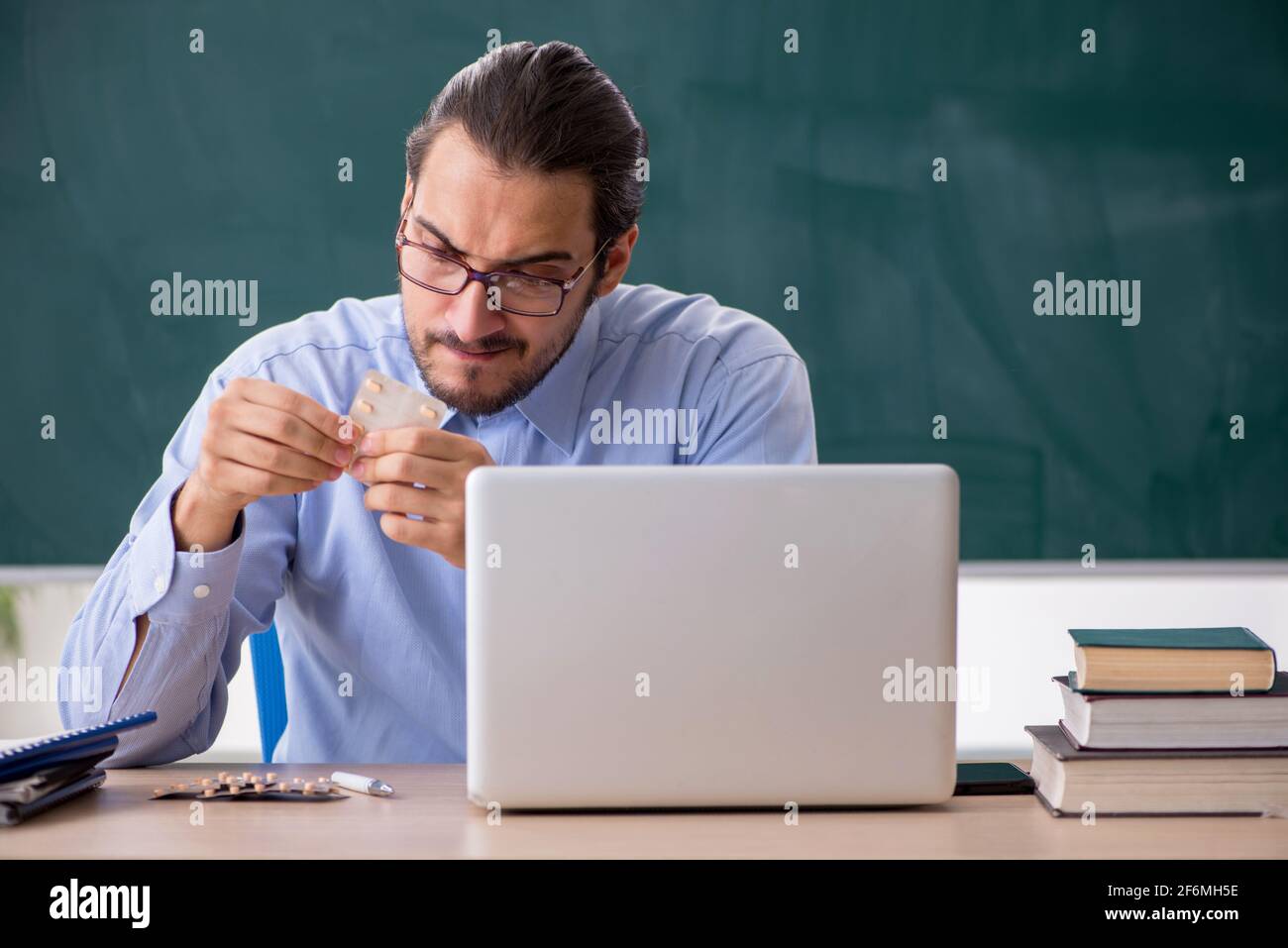Student unwell classroom hi-res stock photography and images - Alamy
