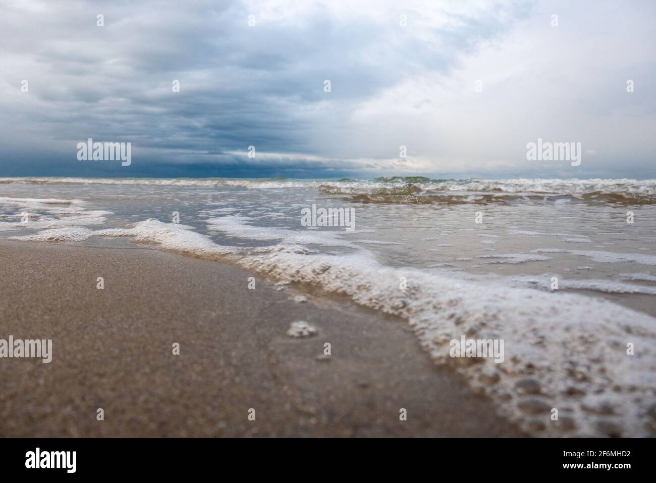 Sea water with waves and cloudy sky during a bad weather day Stock ...