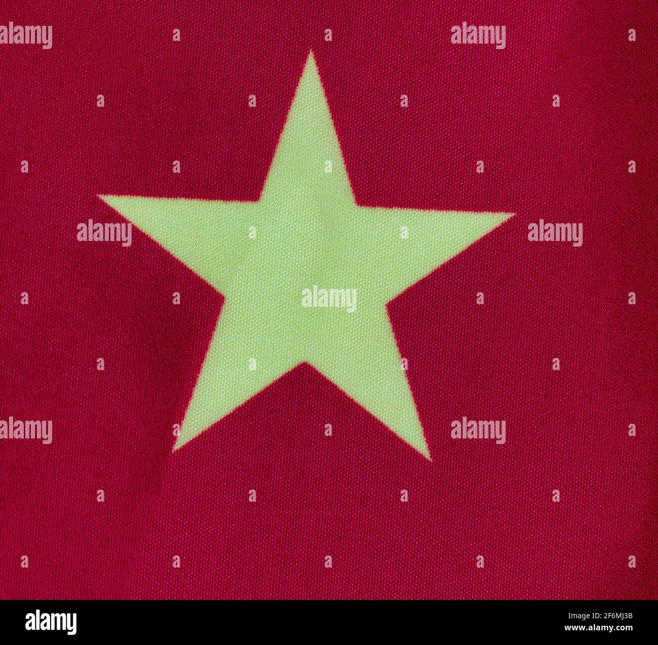 Single yellow star on red cloth background for national China symbol in ...