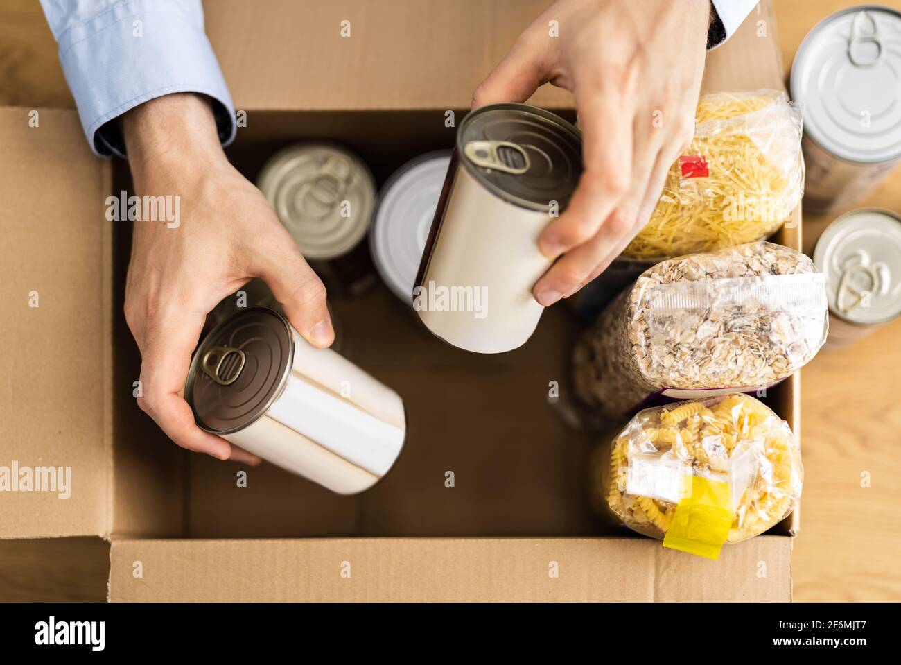 Food Drive Bank. Donating Tin Can Box Stock Photo - Alamy