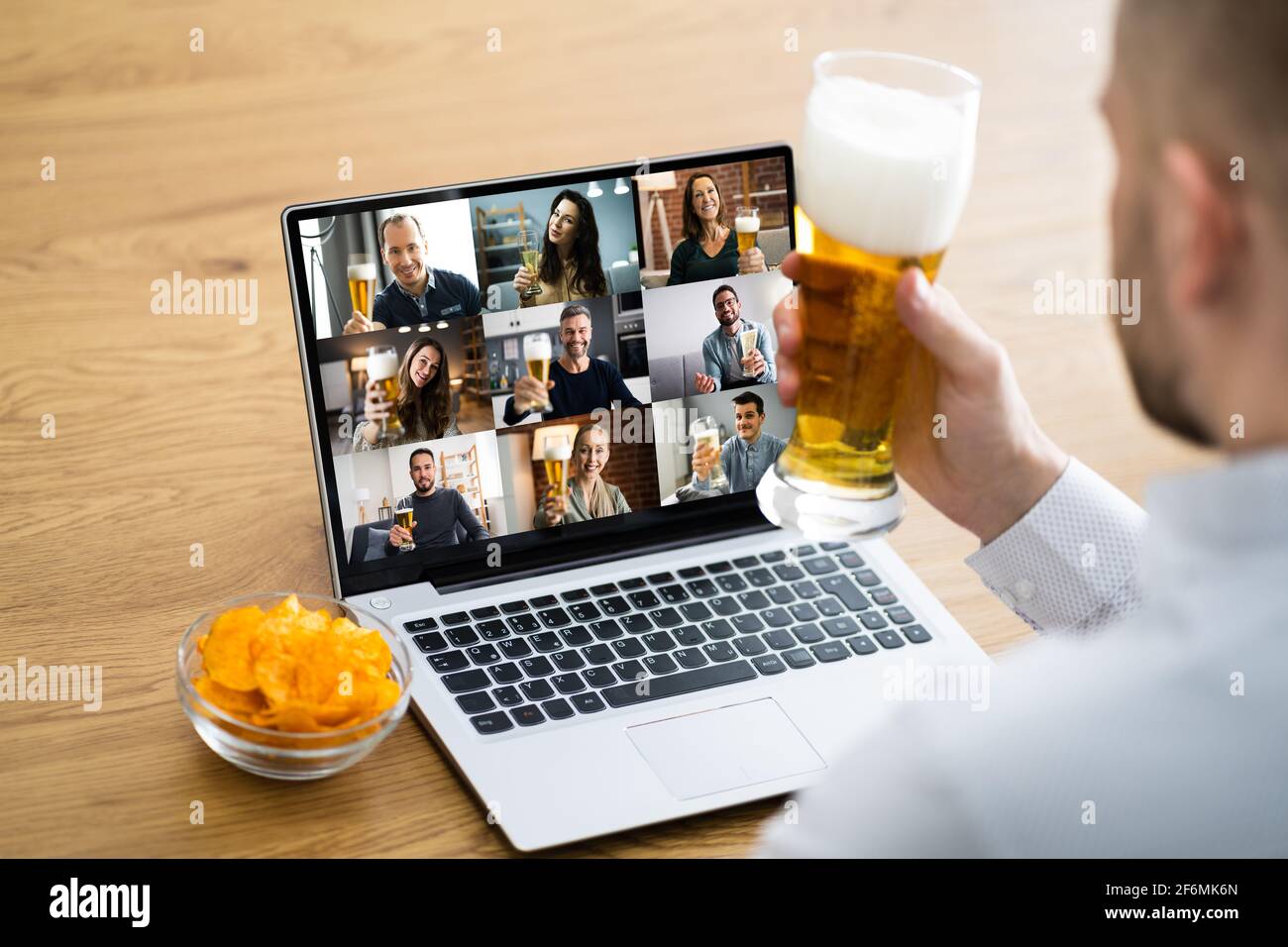 Online Virtual Beer Drinking Party On Laptop Stock Photo - Alamy